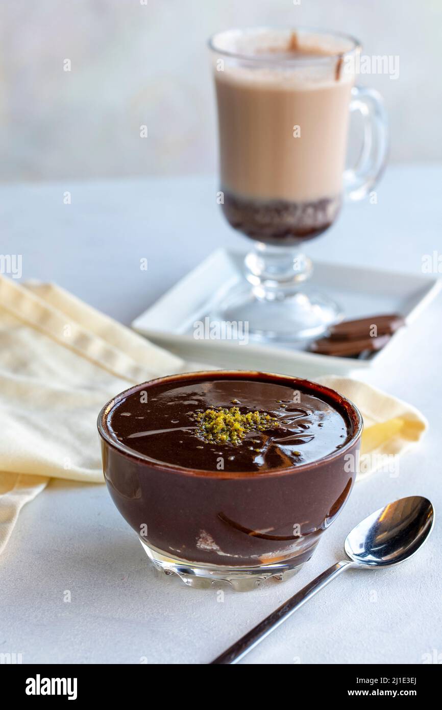 Chocolate pudding or supangle dessert on a white background. With hot ...