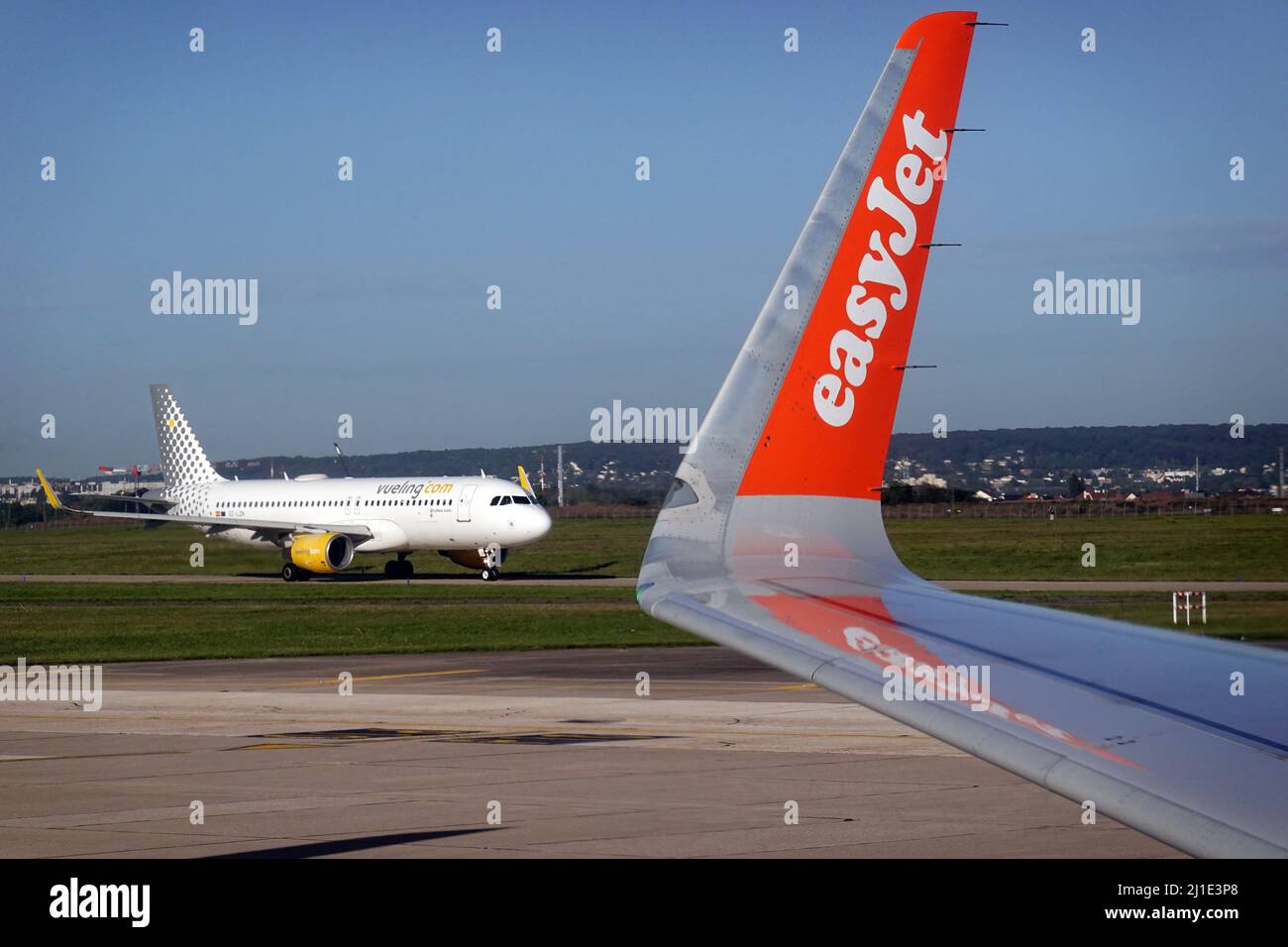 04.10.2021, France, , Paris - Aircraft of the Vueling and winglet with ...