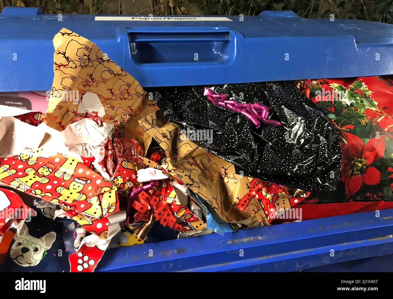 26.12.2021, Germany, , Berlin - Christmas wrapping paper two days after ...