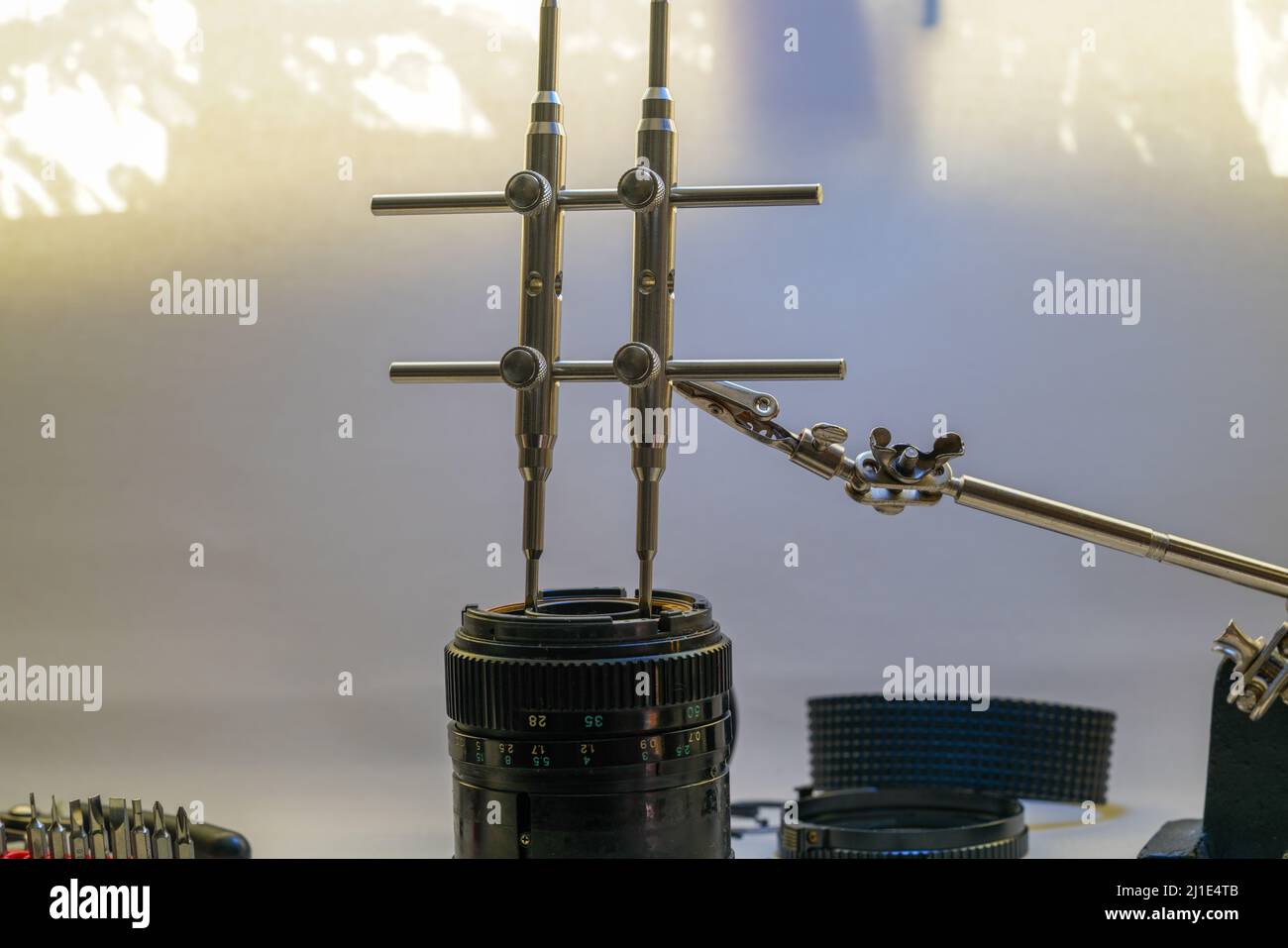 A screwdriver key for the rings that hold the lens Stock Photo - Alamy