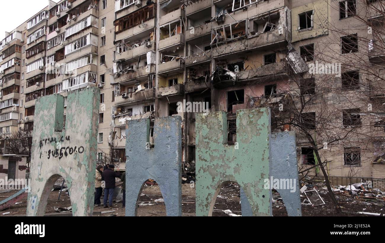A damaged residential building hit by an early morning missile strike ...