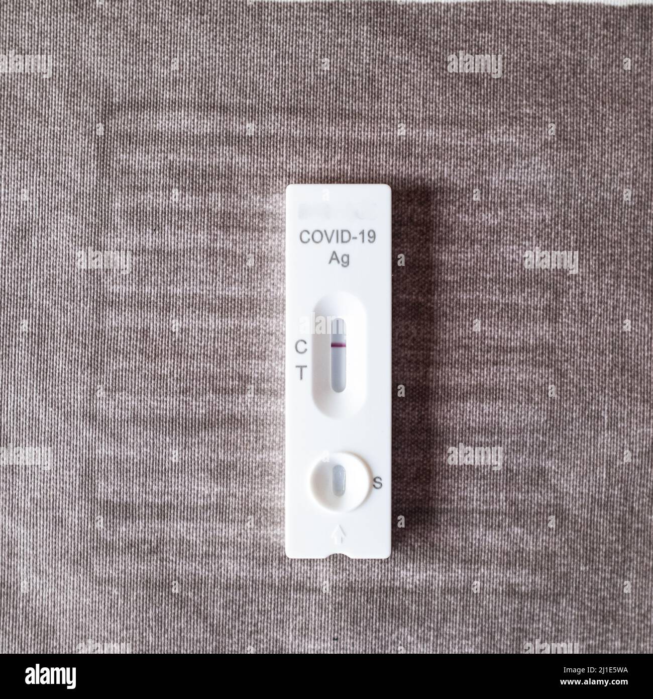 Negative Covid antigen test close up still on a grey background Stock ...
