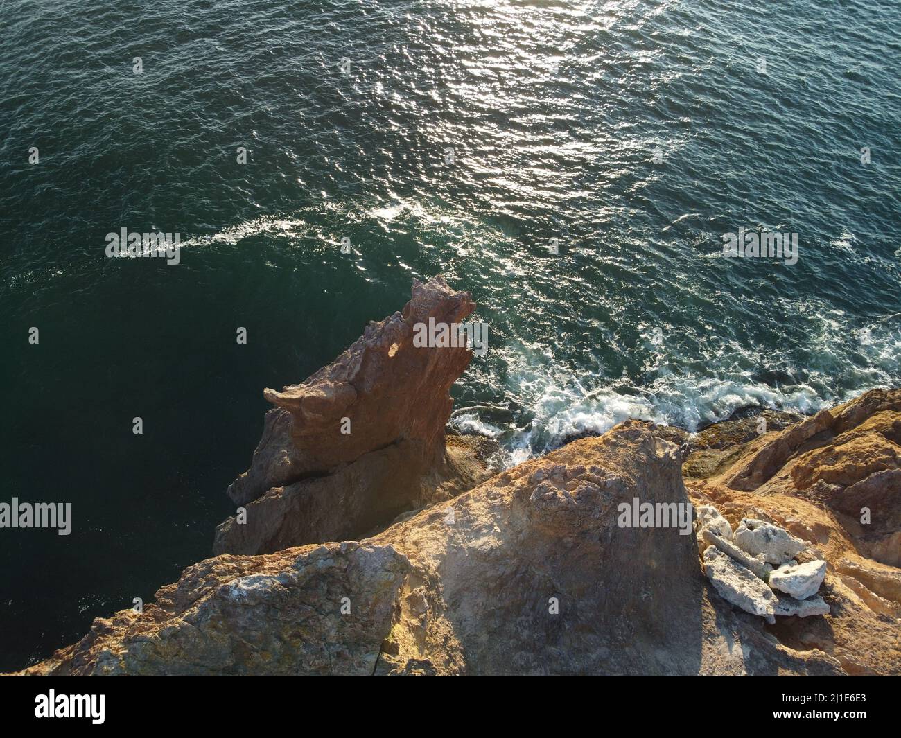 Dragon head arise from the water - The rock or lava formation with the ...