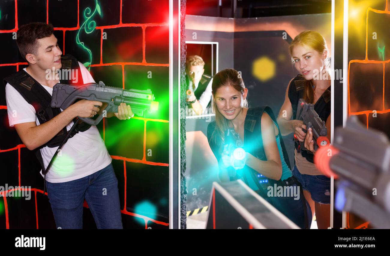 Positive players playing in teams Stock Photo - Alamy