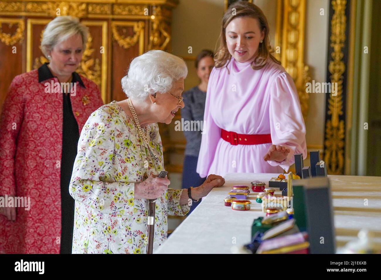 Queen Elizabeth II views a display of artefacts from British craftwork ...