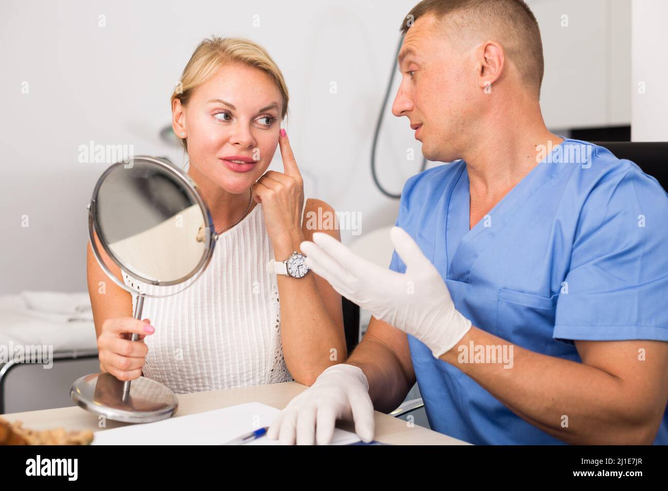 Woman is talking with specialist about halthy of skin of face Stock ...