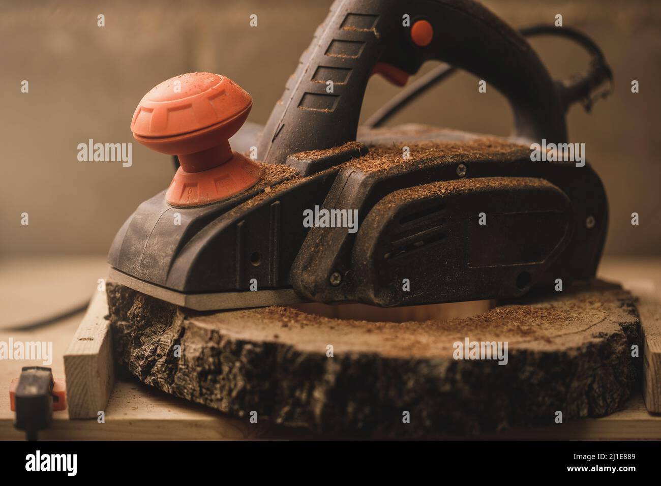 Portable electric wood planer in the workshop Stock Photo - Alamy