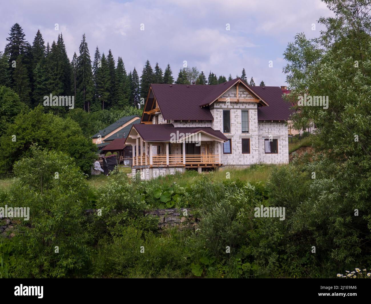 Residential building among forest hi-res stock photography and images ...