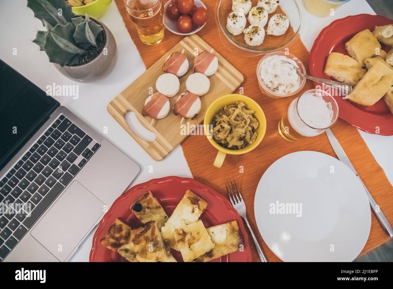 View from the top of a table with many foods ready for an aperitif with ...