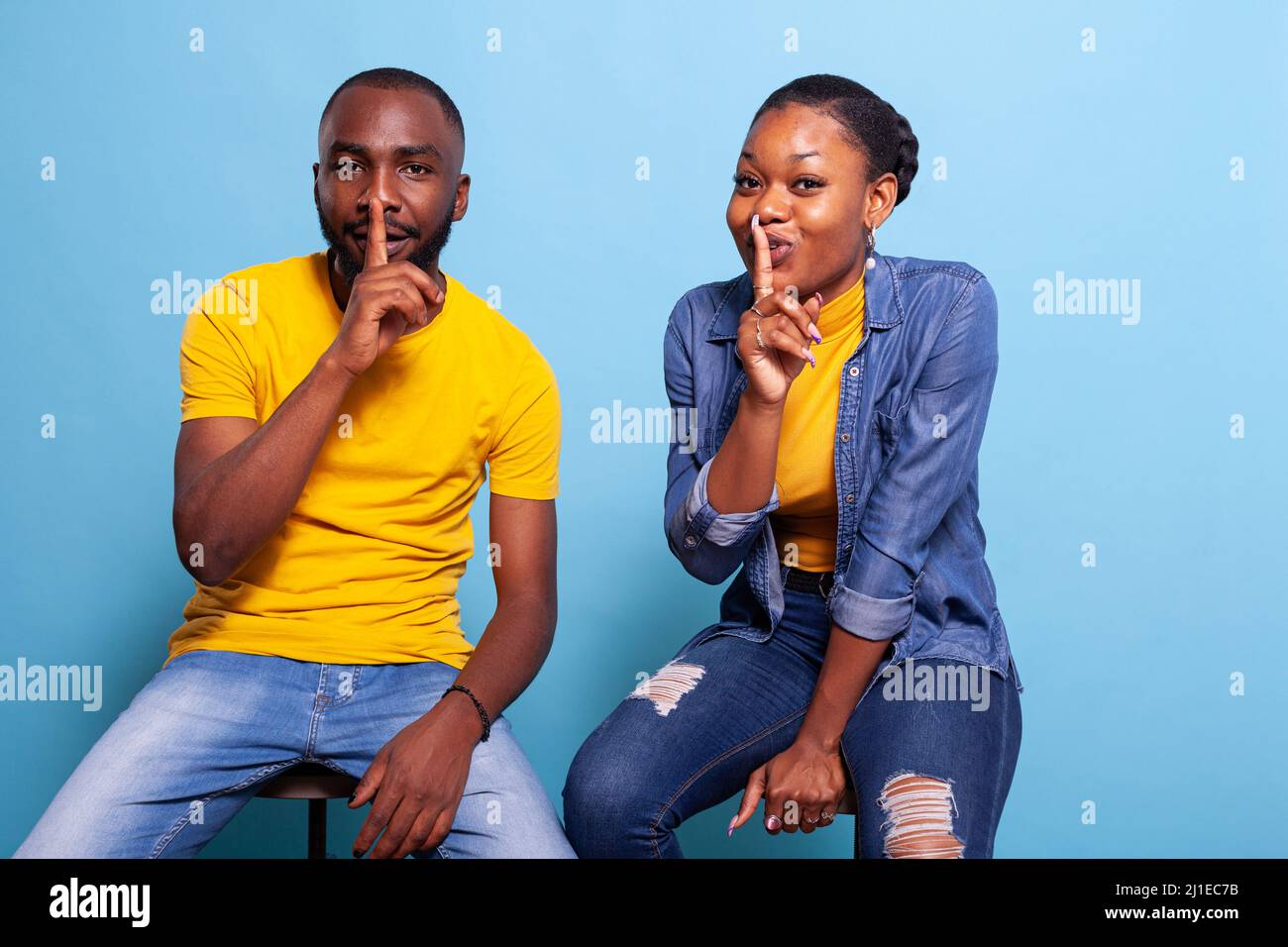 Finger over mouth quiet hi-res stock photography and images - Alamy