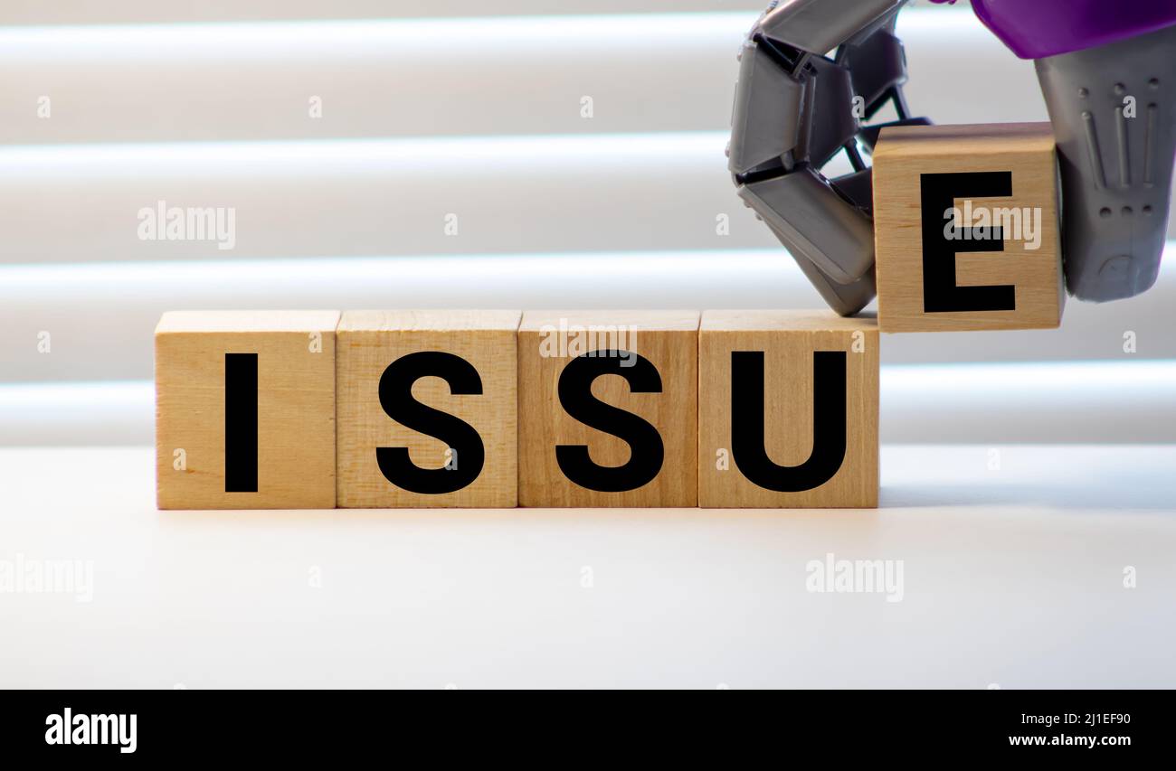Issue word on wooden cubes. Issue concept Stock Photo - Alamy