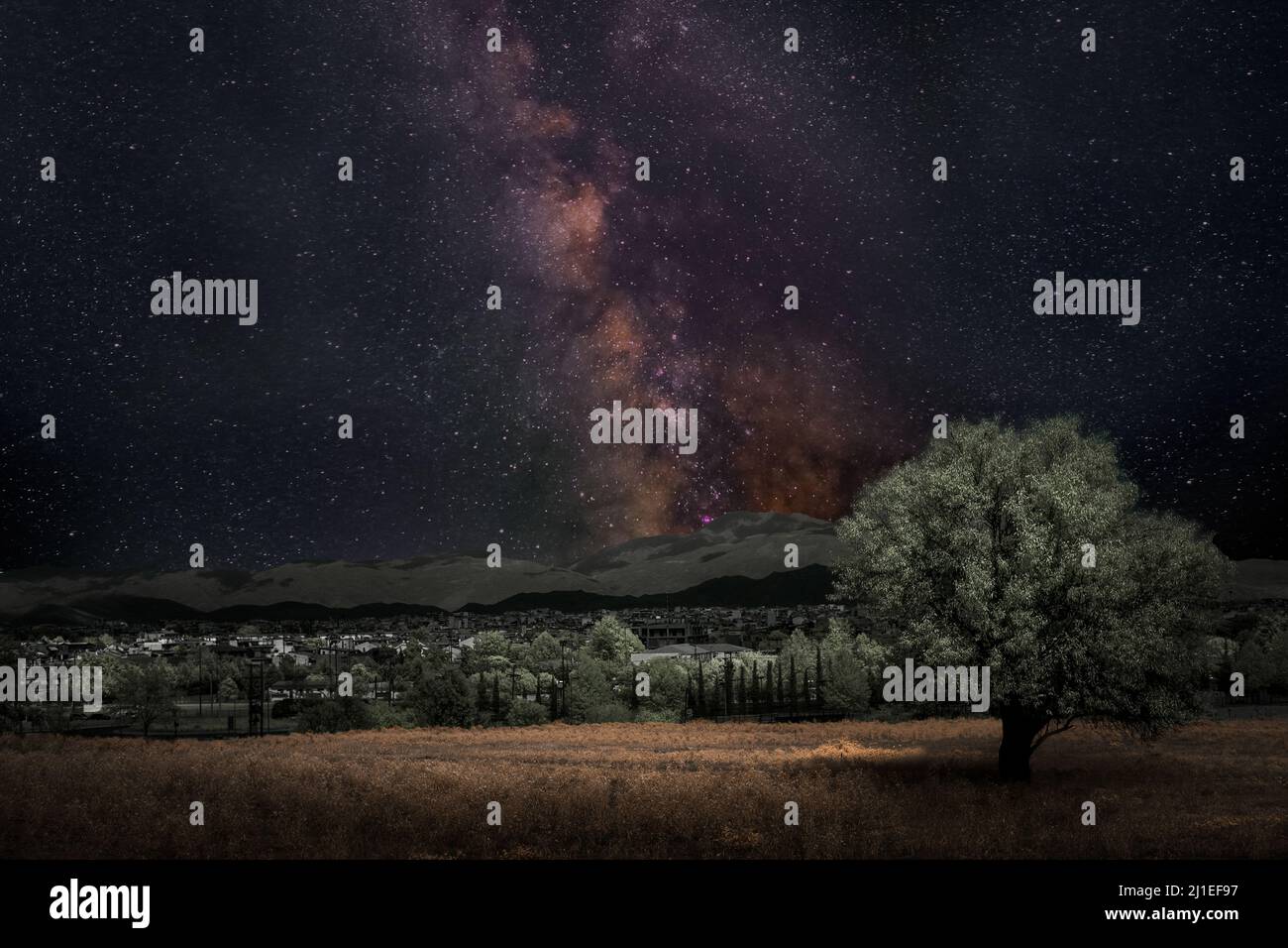 Infrared multi colored landscape of the milky way Stock Photo - Alamy
