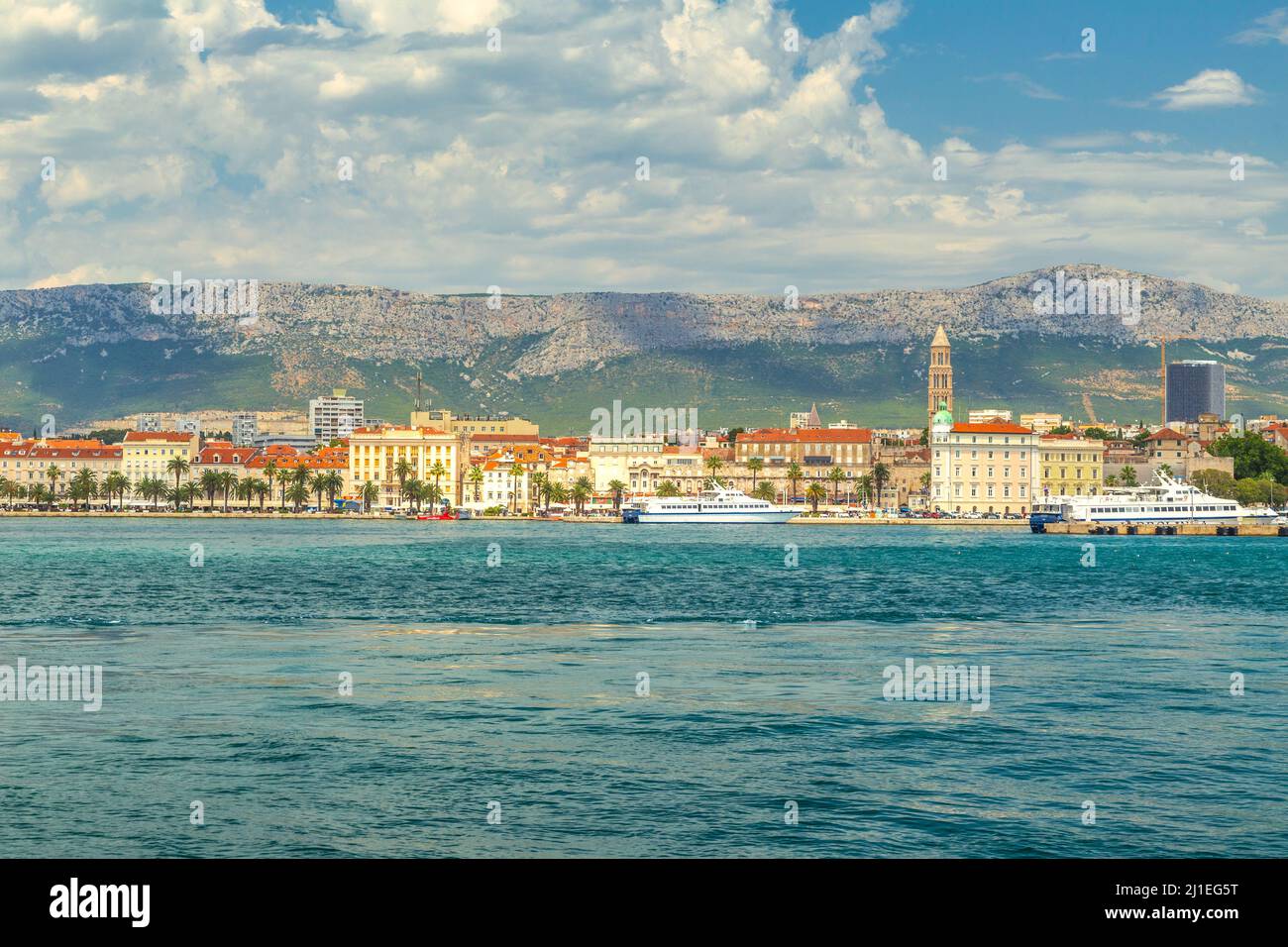 View from the sea on the historic center of Split with mountains in the ...