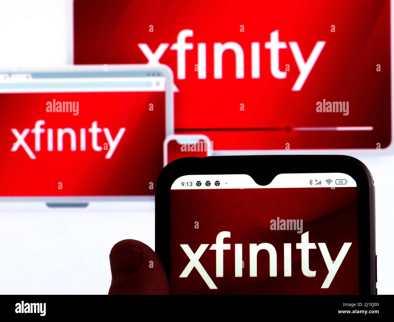 In this photo illustration, the Xfinity logo is displayed on a ...