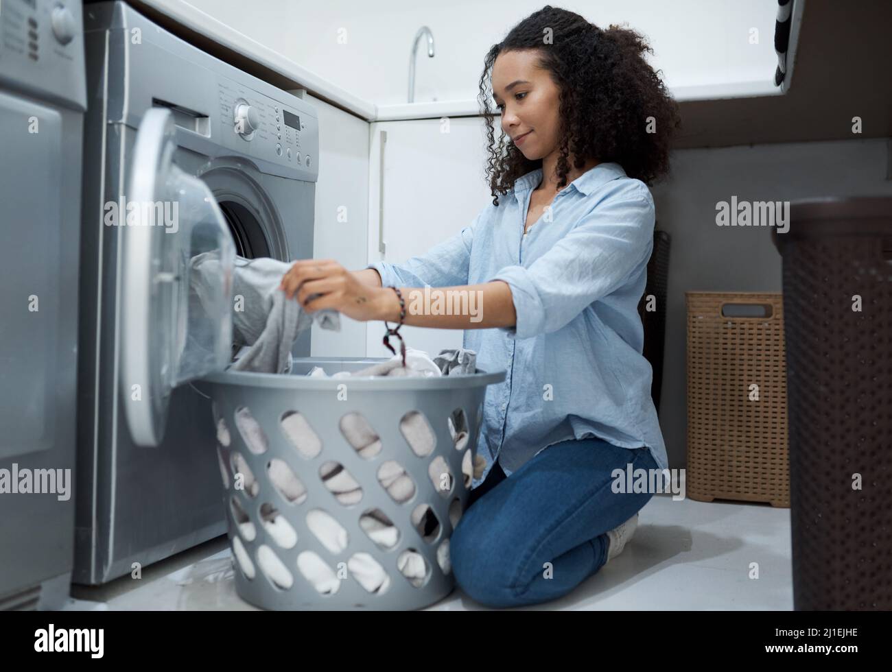 African woman use washing machine hi-res stock photography and images ...