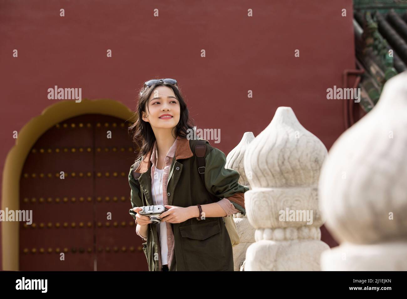 Female tourist touring classical Chinese architecture - stock photo ...
