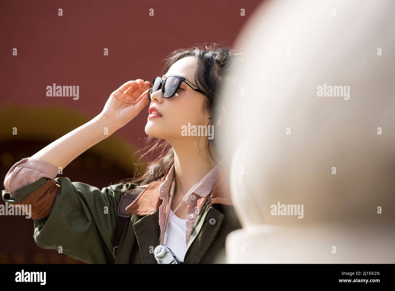 Female tourist enjoying the scenery - stock photo Stock Photo - Alamy