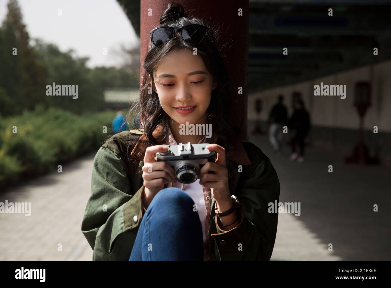 Female tourist resting in a pavilion in a classical park - stock photo ...