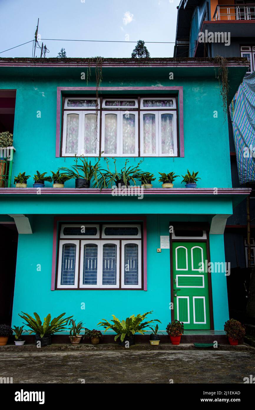 View of a beautiful local house painted in blue in a village in Pelling ...