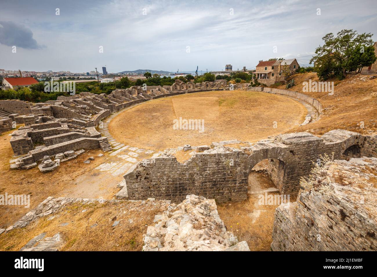 Ruins of the amphitheater of archaeological roman settlement in the ...