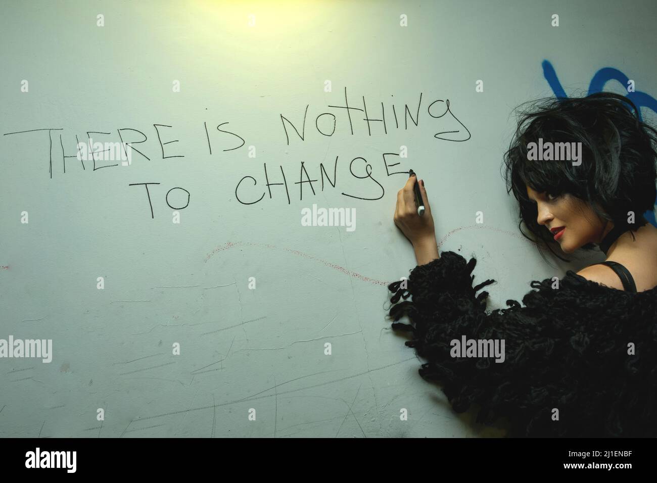 Freaky woman in dark tunnel with graffiti Stock Photo - Alamy