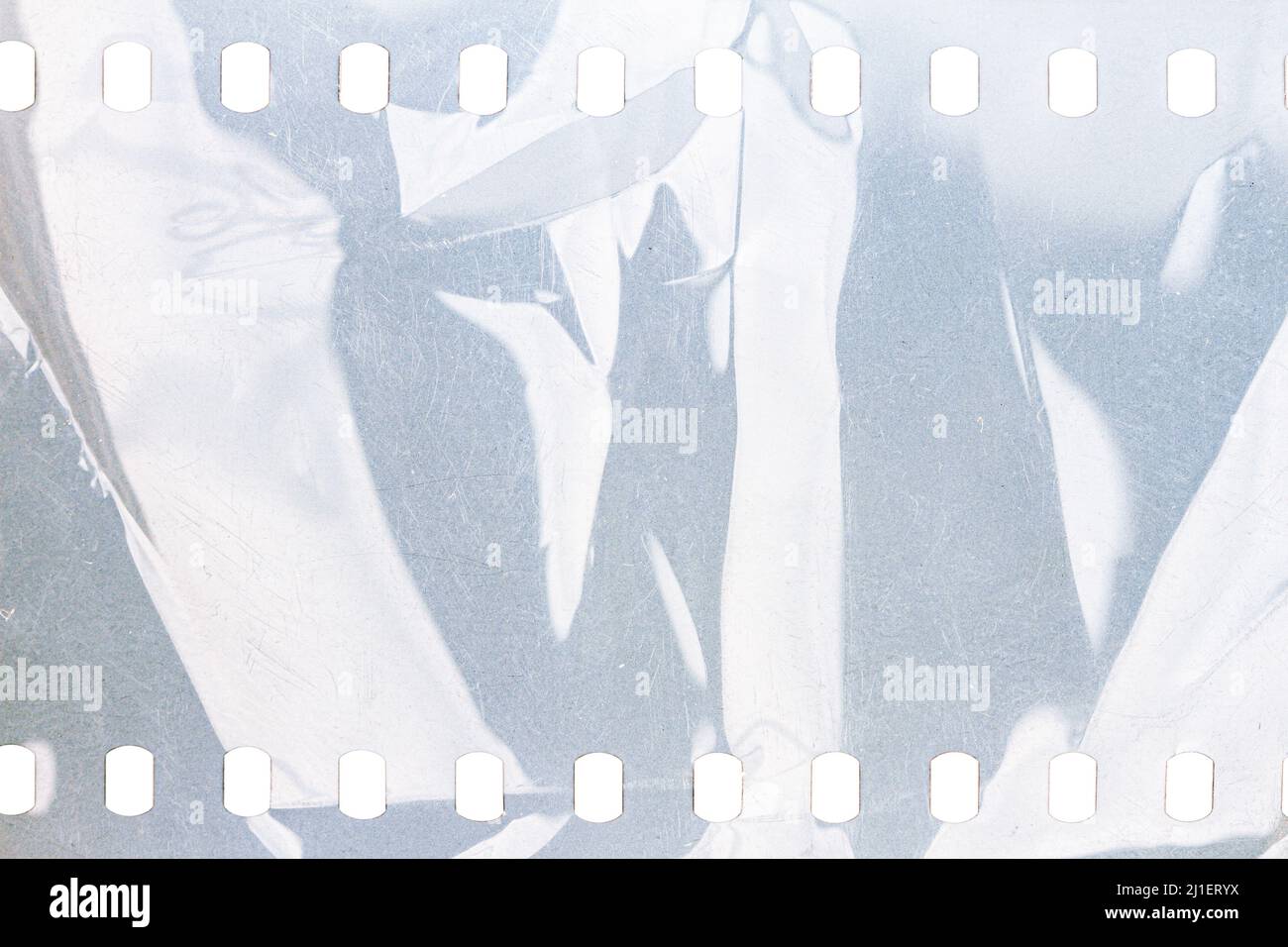 Dusty and grungy 35mm film texture or surface. Perforated scratched ...