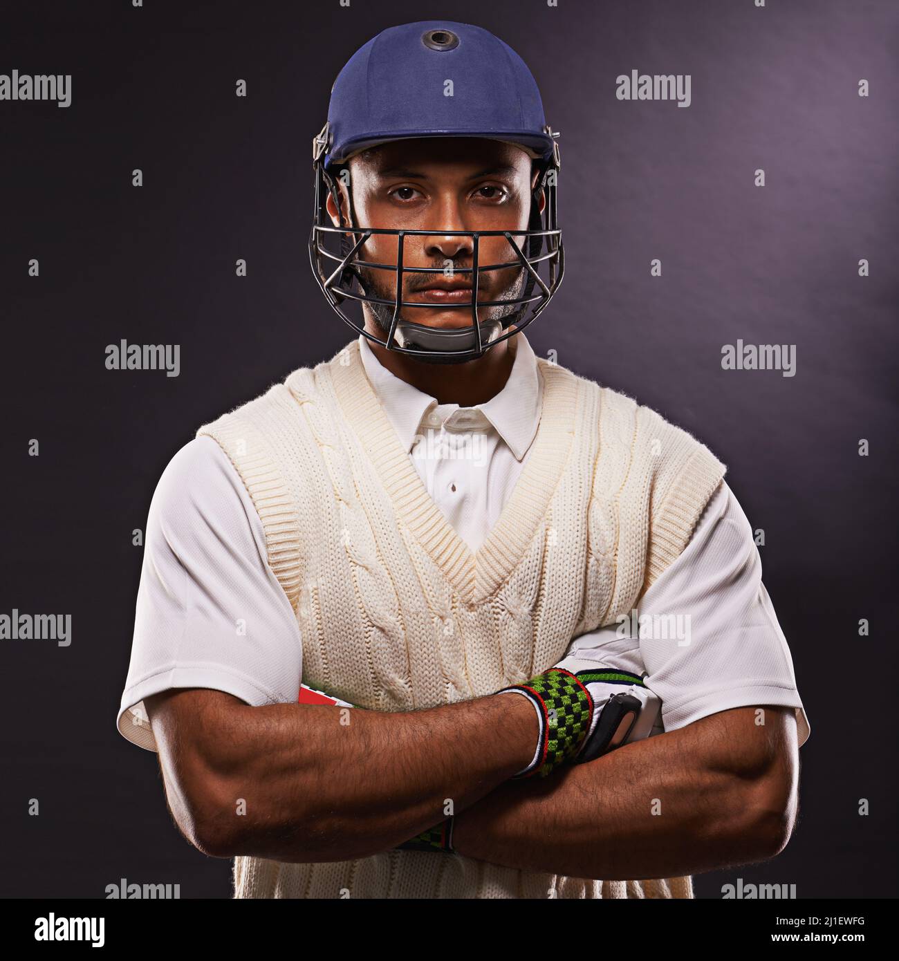 Hes up next. A cropped shot of an ethnic young man in cricket attire ...