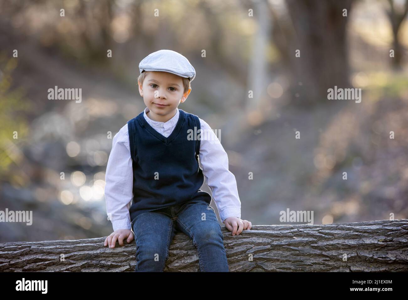 Amazing creamy portrait of a beautiful stylish toddler child, boy ...
