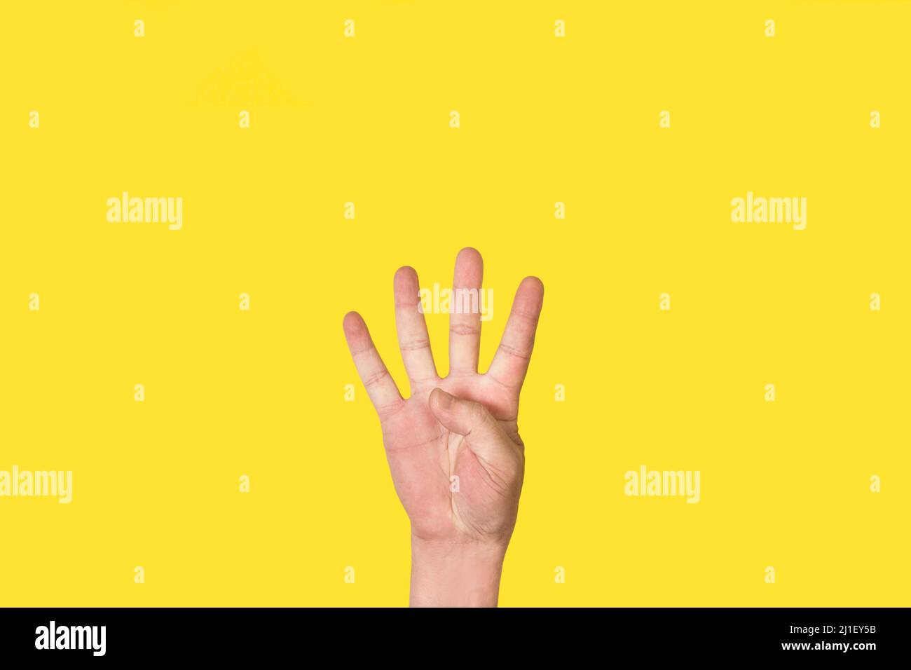Hand gesture number four closeup hi-res stock photography and images ...