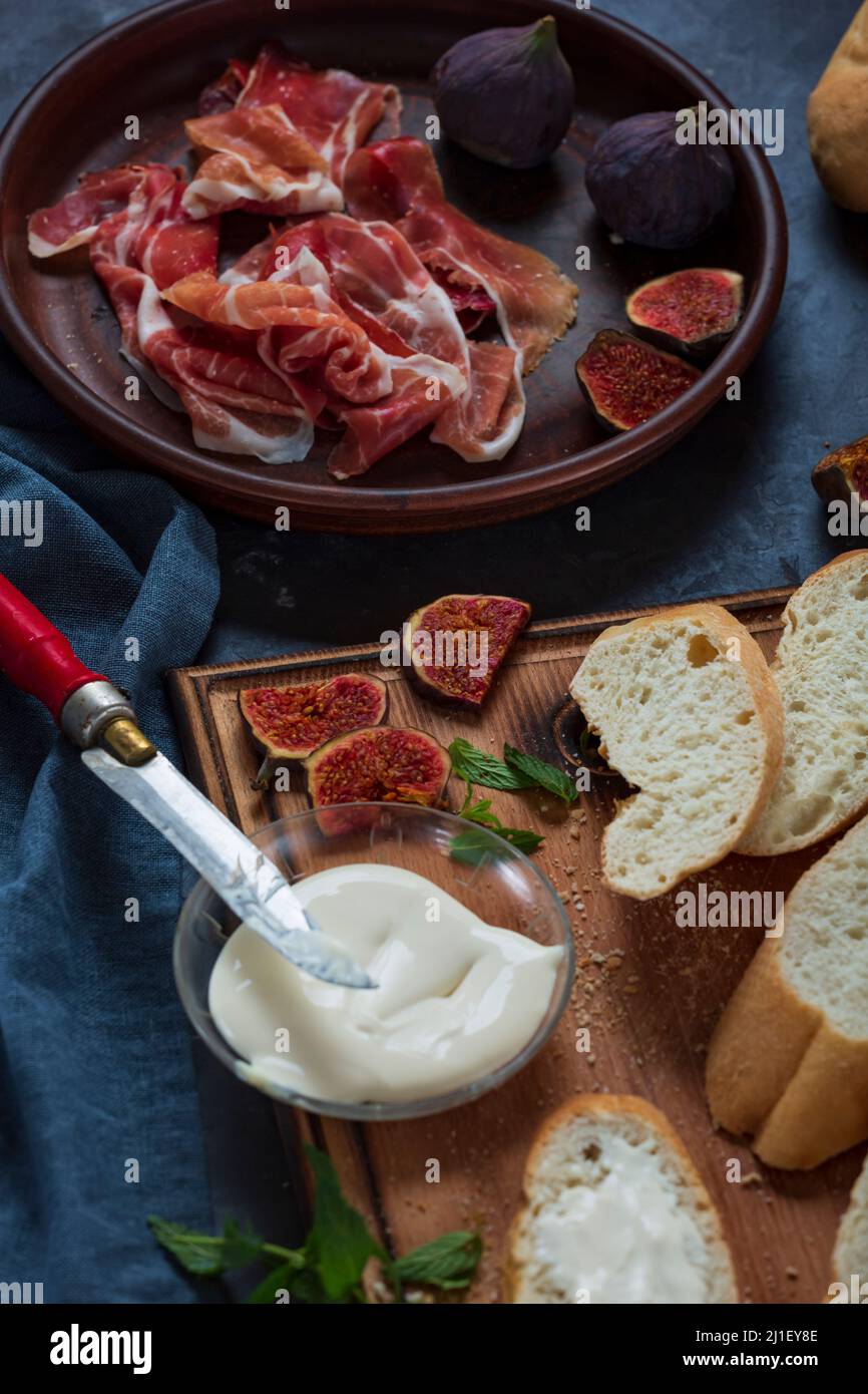Making ham sandwiches and tapas ingredients, CLOSE UP Stock Photo - Alamy