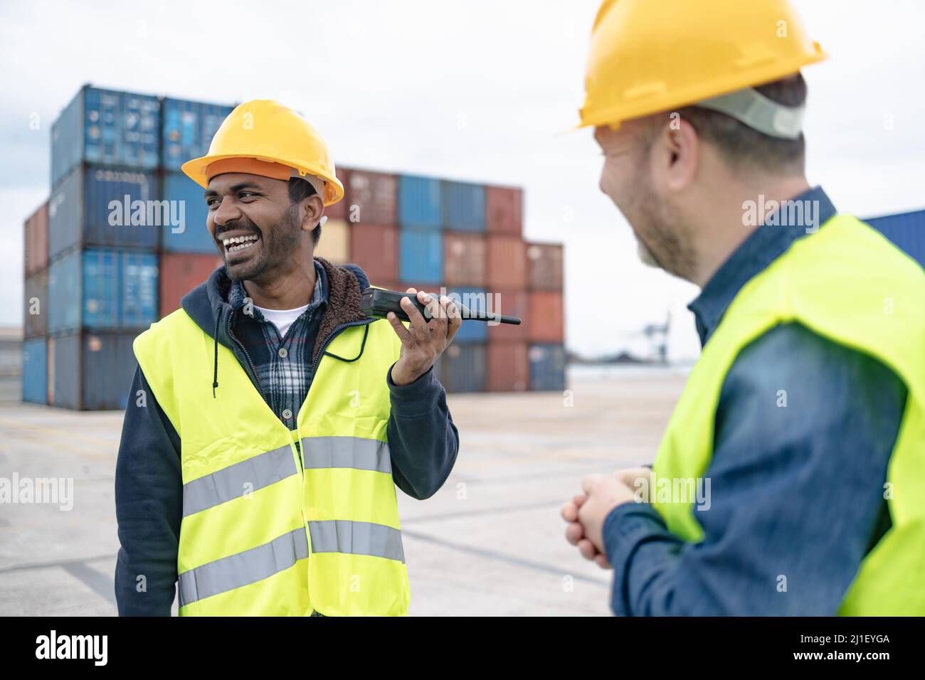 Industrial engineers working in logistic terminal of container cargo ...