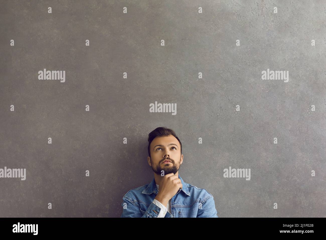 Man leaning on wall with hand hi-res stock photography and images - Alamy
