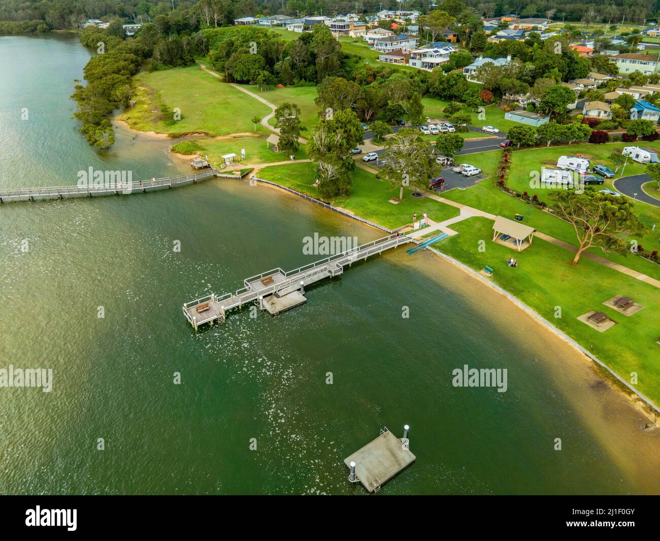 An aerial view of a beautiful landscape with ocean and buildings in ...