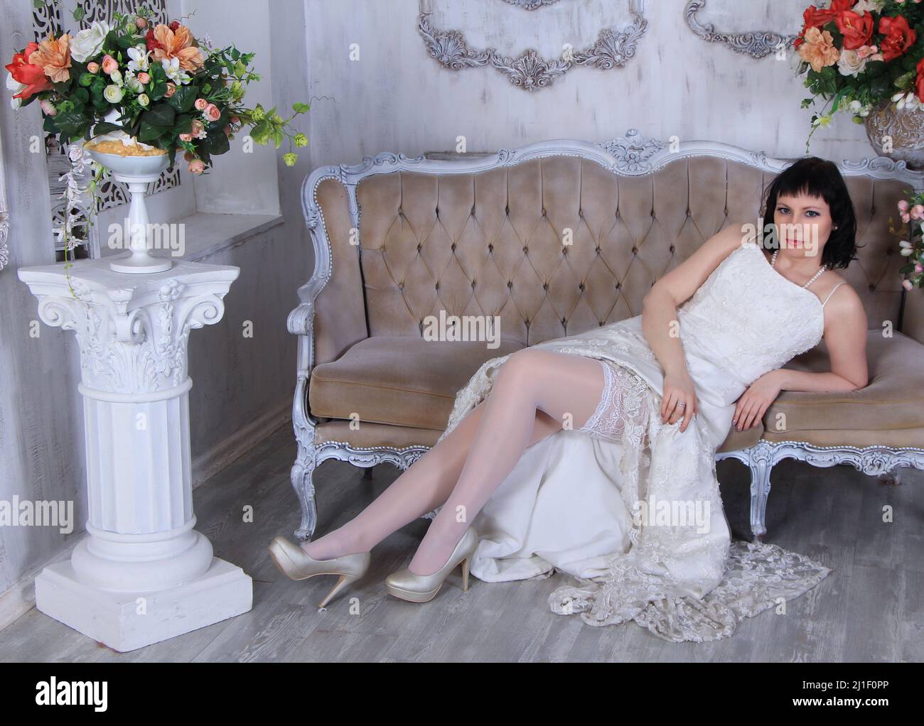 Beautiful Long Legged Brunette Girl In Wedding Dress And White