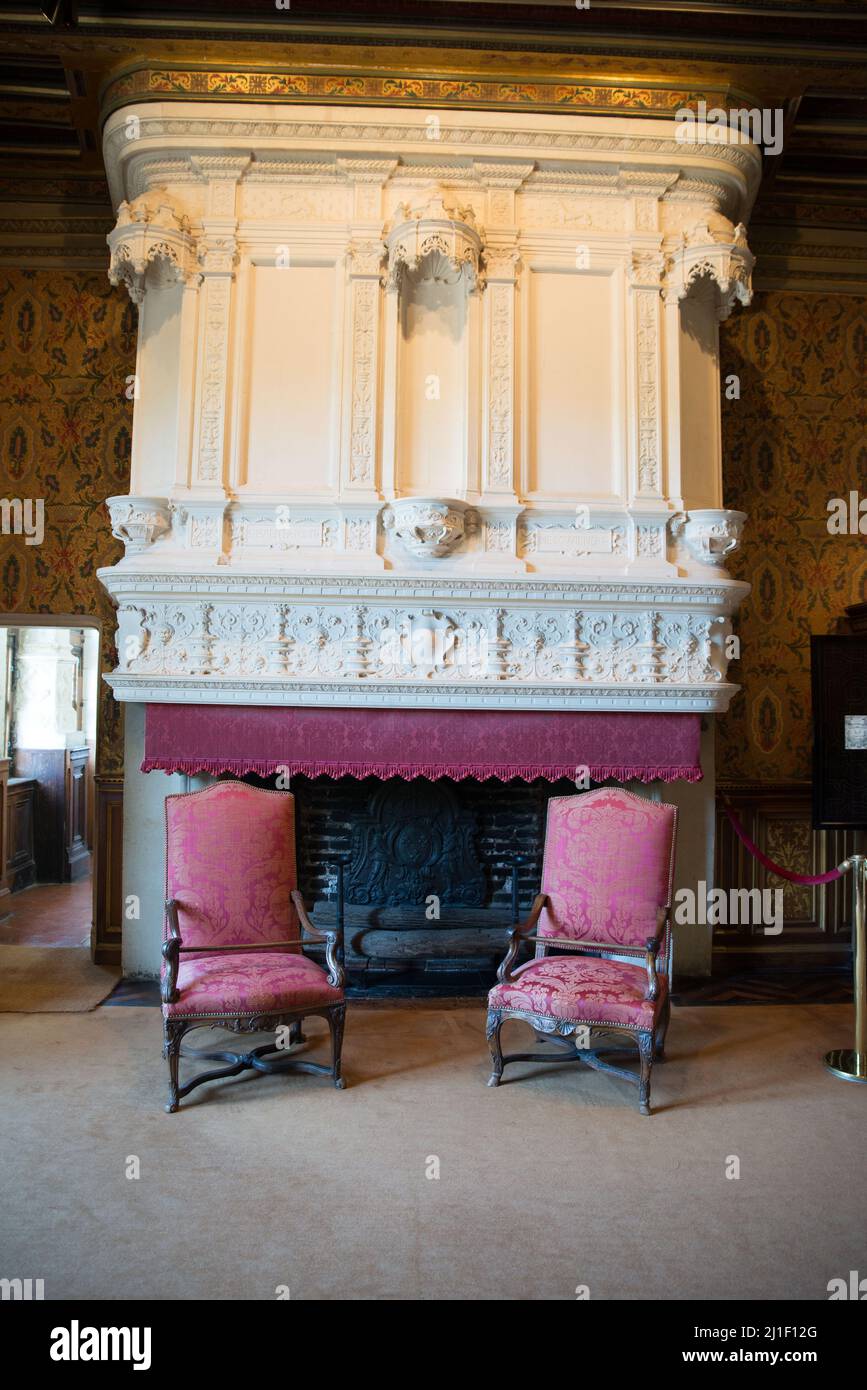 A Victorian Upholstered Lounge Chairs with home fire heater and granite ...