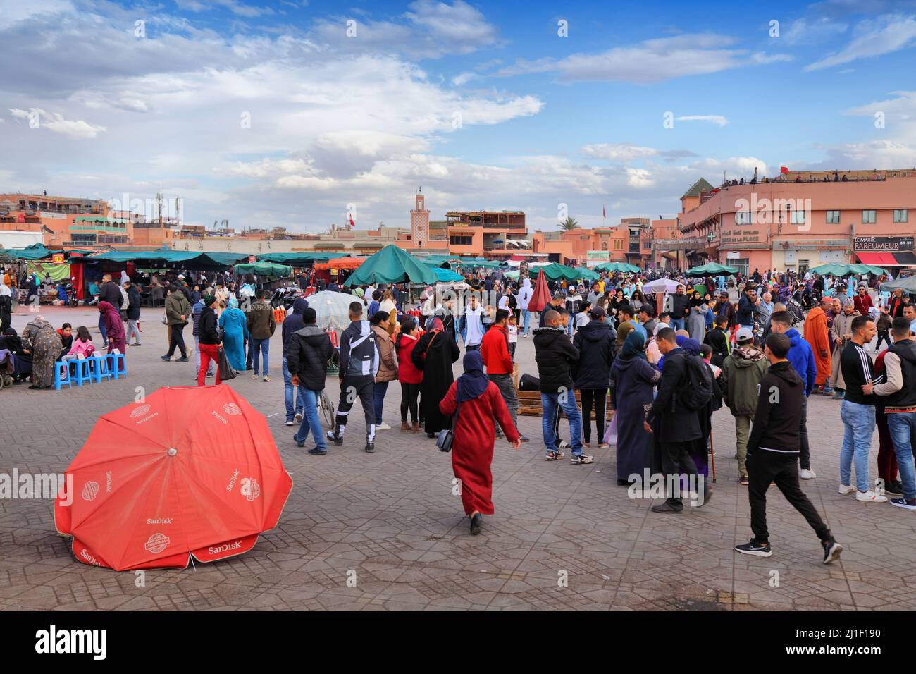 MARRAKECH, MOROCCO - FEBRUARY 20, 2022: People visit Jemaa el-Fnaa ...