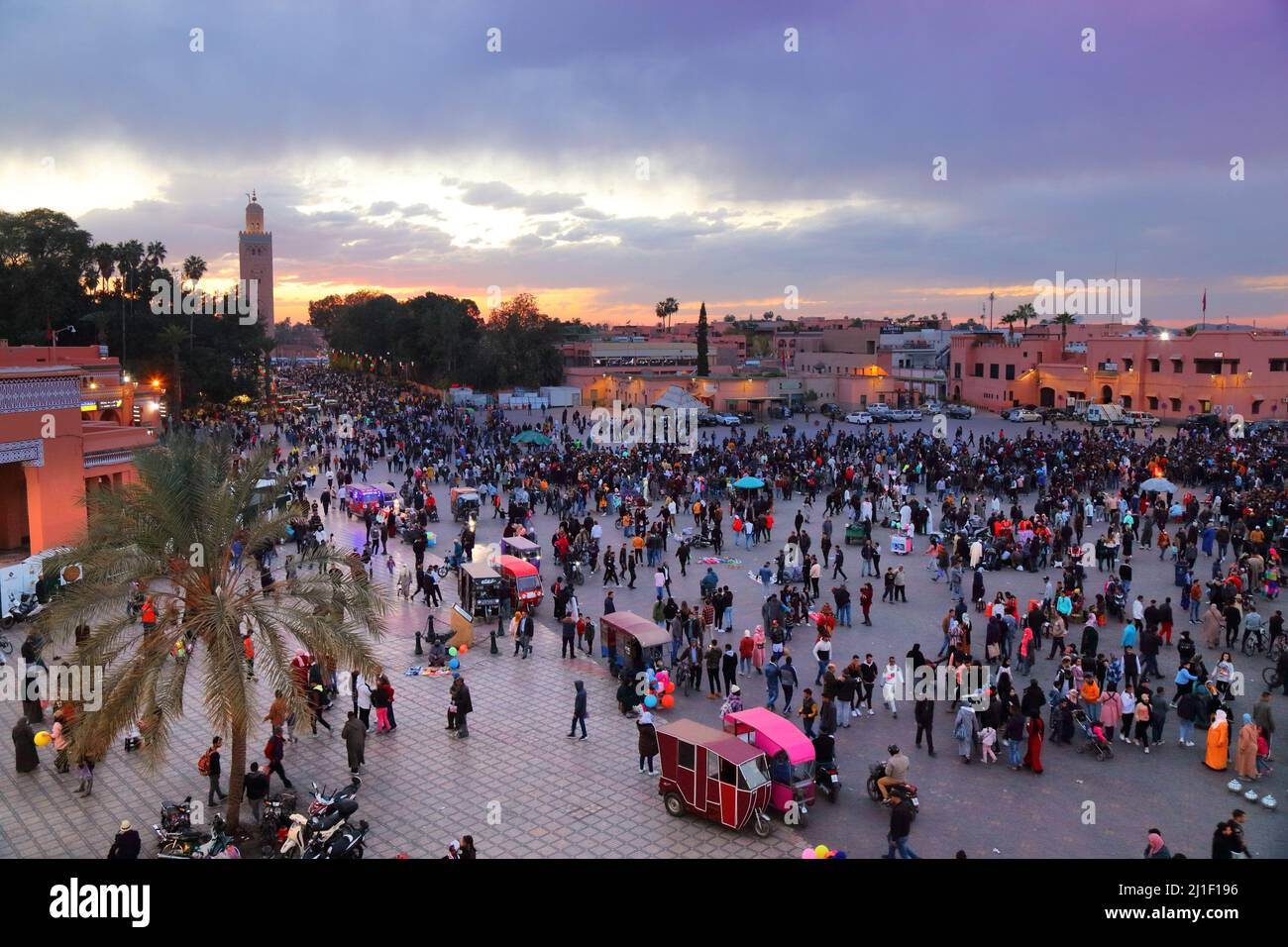 MARRAKECH, MOROCCO - FEBRUARY 20, 2022: People visit Jemaa el-Fnaa ...
