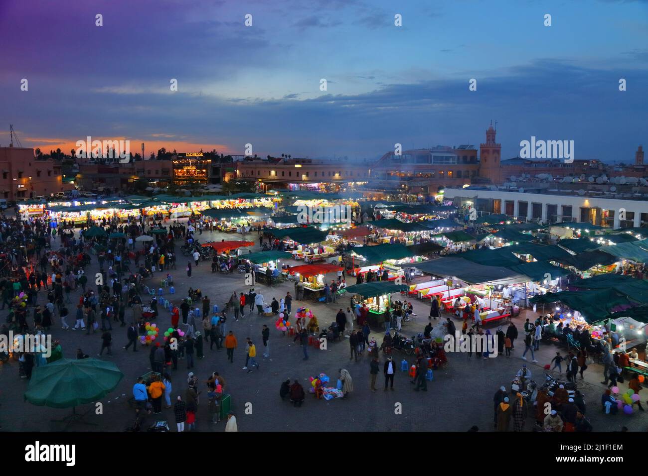MARRAKECH, MOROCCO - FEBRUARY 20, 2022: People visit Jemaa el-Fnaa ...