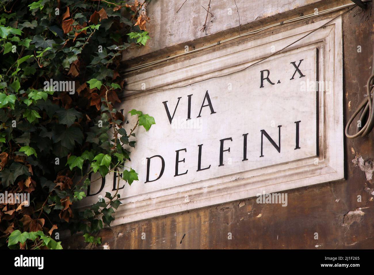 Rome detail. Via de Delfini - old street name sign in Rome, Italy ...