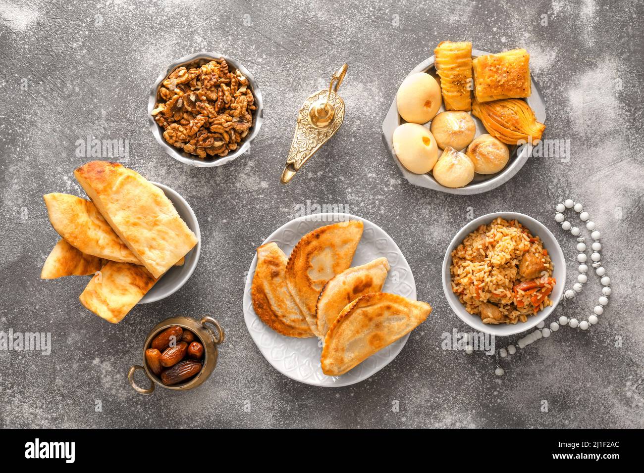 Traditional Eastern dishes with Aladdin lamp on grunge background Stock ...