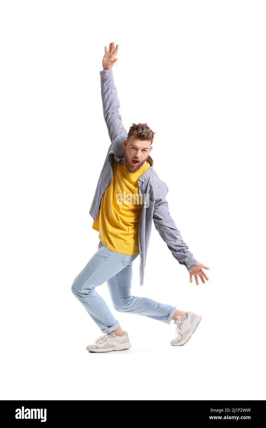 Cool dancing young man isolated on white Stock Photo - Alamy