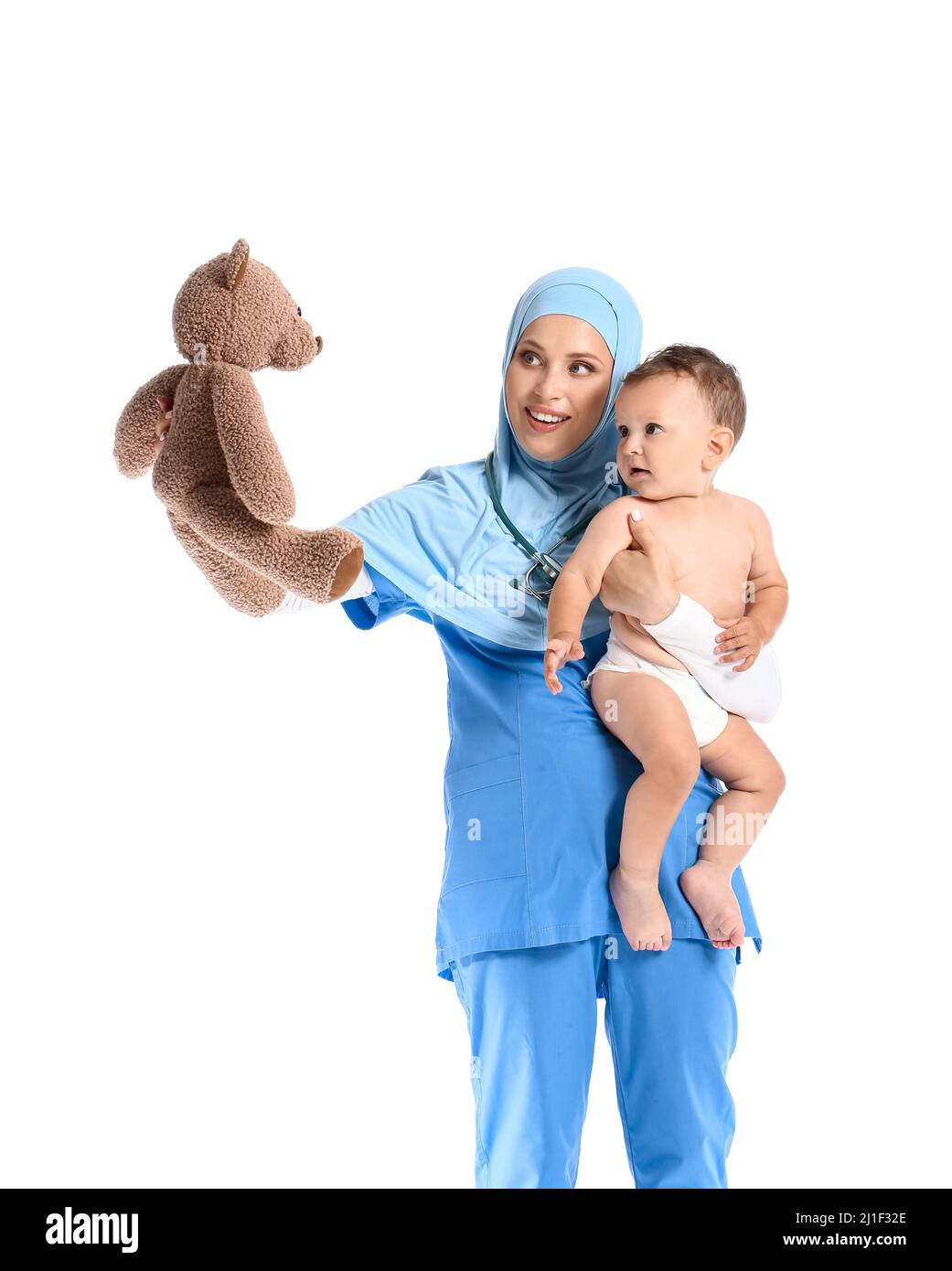 Muslim pediatrician with baby boy on white background Stock Photo - Alamy