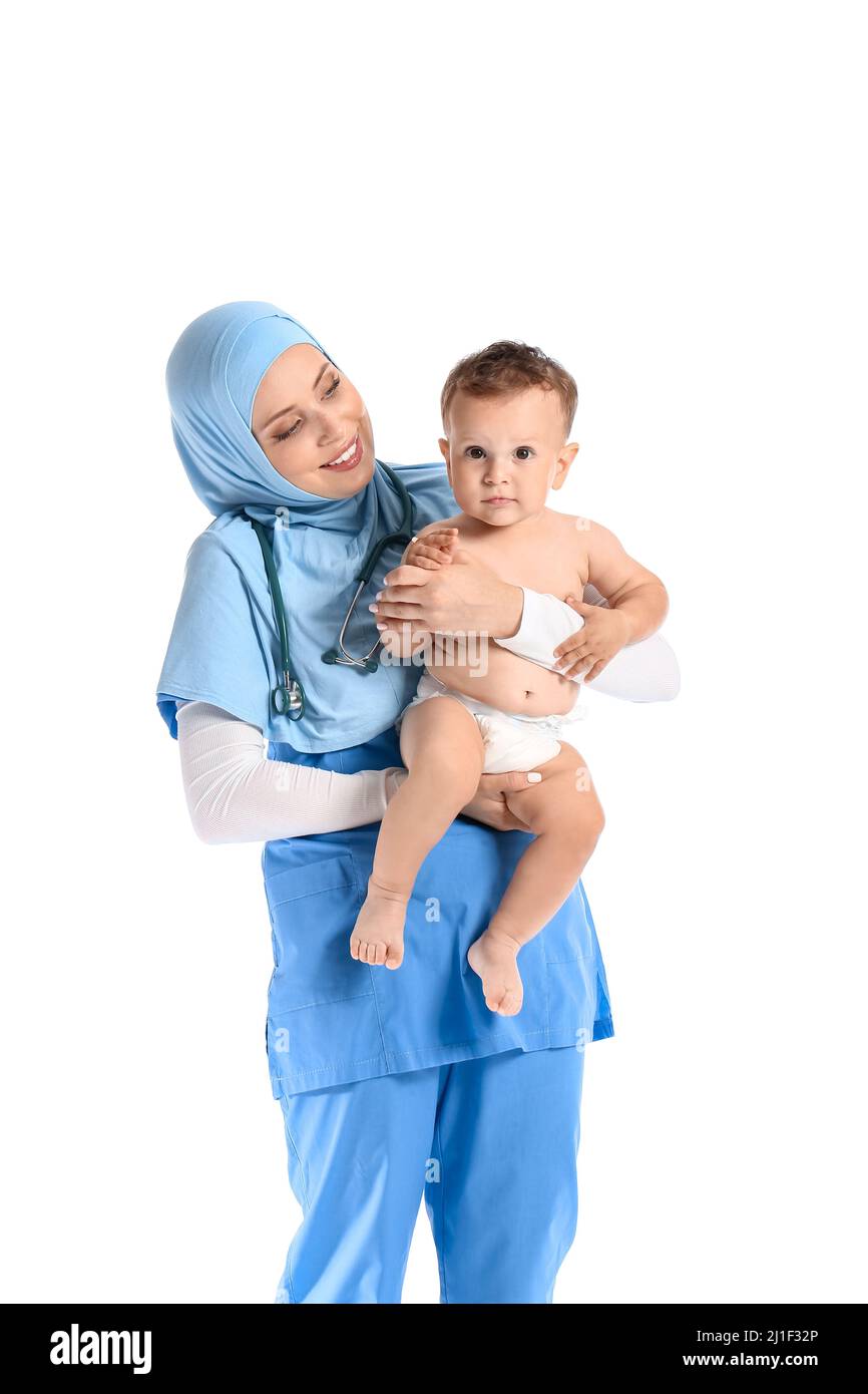 Muslim pediatrician with baby boy on white background Stock Photo - Alamy