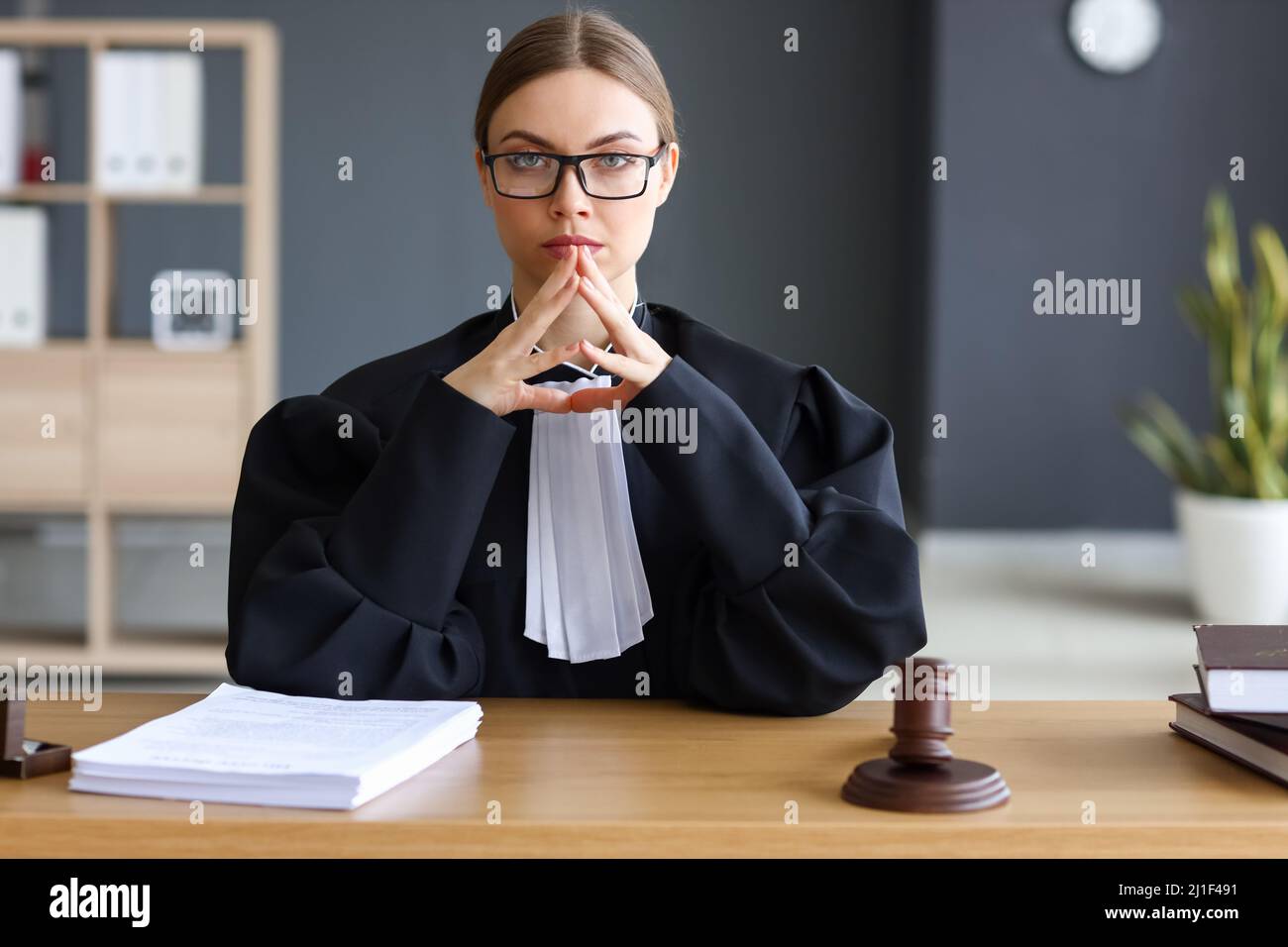 Female judge at workplace in courtroom Stock Photo - Alamy