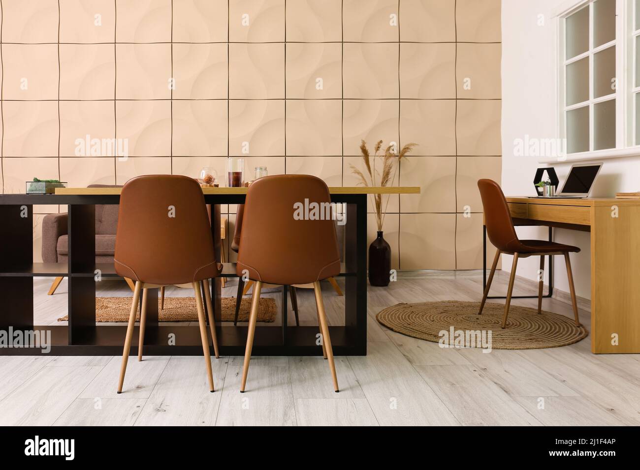 Interior of stylish dining room with modern workplace Stock Photo - Alamy