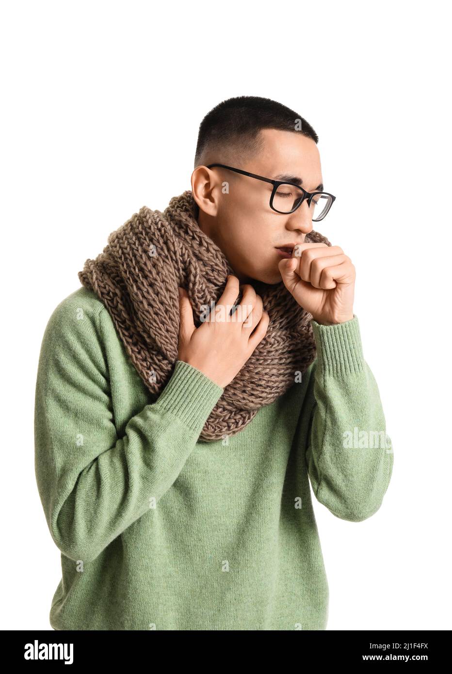 Ill coughing Asian man with sore throat on white background Stock Photo ...