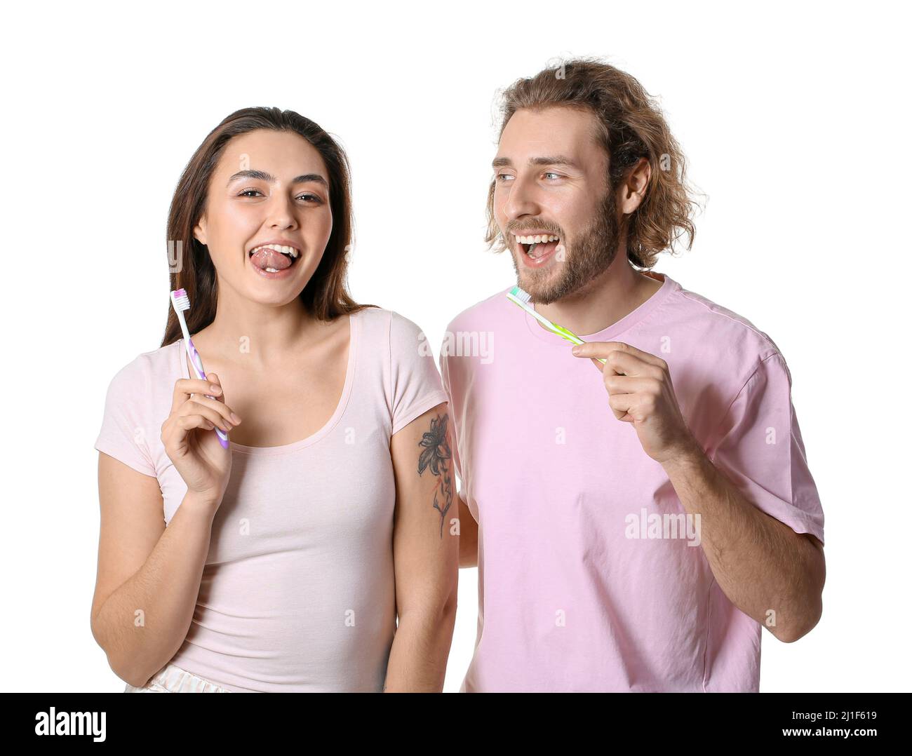 Happy young couple toothbrushes hi-res stock photography and images - Alamy