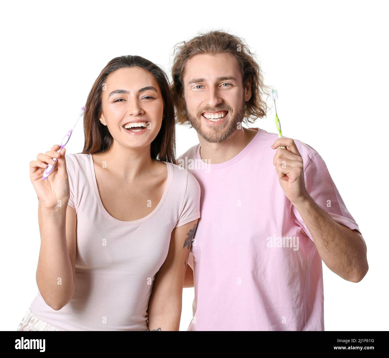Happy young couple toothbrushes hi-res stock photography and images - Alamy