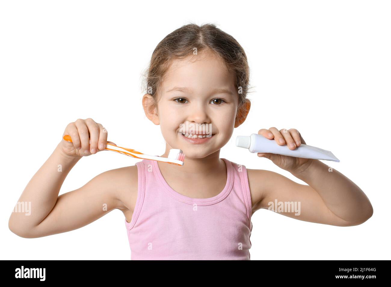 Adorable little girl with tooth brush and paste on white background ...