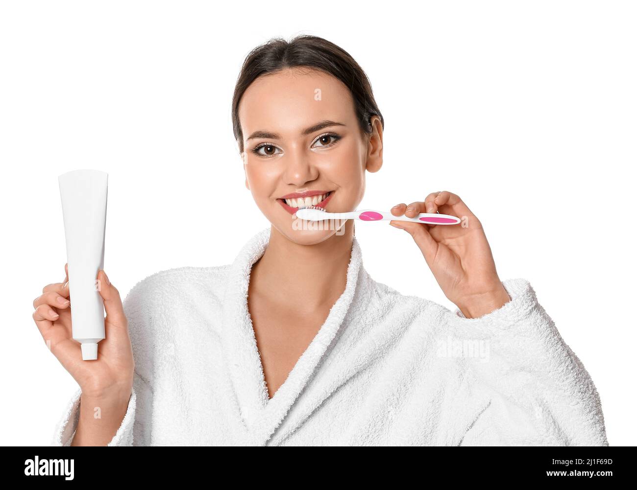 Pretty Young Woman With Paste Brushing Teeth On White Background Stock